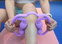 China Complete Muscle Massage Kit: 4-Wheel Muscle Roller with Leg Clamps for sale