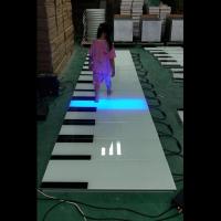 China Commercial LED Floor IP67 Portable RGB Color Changing Curved Outdoor Projection Giant Floor Piano With Sound Piano Dance for sale