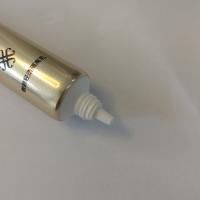 China High Glossy Cosmetic Laminated Tubes D22mm Acrylic cap 50ml 60ml for sale