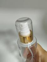 China 100ml PET Cosmetic Bottle With Gold Sprayer Plastic Makeup Bottles for sale