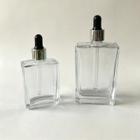 China Rectangle Clear Glass Dropper Bottles For 50ml 100ml Essential Oil for sale