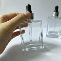 China Rectangle Clear Glass Dropper Bottles For 50ml 100ml Essential Oil for sale