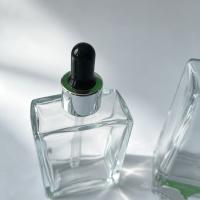 China Rectangle Clear Glass Dropper Bottles For 50ml 100ml Essential Oil for sale