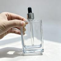 China Rectangle Clear Glass Dropper Bottles For 50ml 100ml Essential Oil for sale