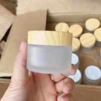 China BONA 50g 100g Glass Cosmetic Jar With Bamboo Lid Cap OEM / ODM for sale