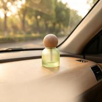 China 10g Glass Perfume Bottle With Round Wooden Cap For Car Air Freshener Bottle Packaging for sale