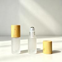 China 5ml 10ml Bamboo Cap Glass Roll On Bottle For Cosmetic Oil for sale