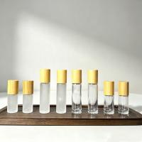 China 5ml 10ml Bamboo Cap Glass Roll On Bottle For Cosmetic Oil for sale