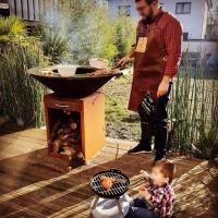 China Wood Charcoal Burning Rust Corten Steel BBQ Grill for Outdoor Cooking for sale