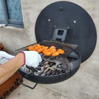 China Outdoor Weathered Corten Metal Fire Pit With Grill Table BBQ for sale