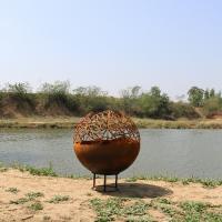 China Outdoor Sphere Corten Steel Fire Pit 80cm Stoves Packed In Wooden Box for sale