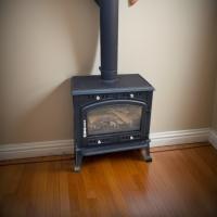 China Manual Ignition Portable Wood Fire Pit Cast Iron Small Stove for sale