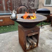 China Customizable BBQ Grill With Removable Ash Catcher Wood/Charcoal Fuel Rust Proof Corten Steel Body for sale