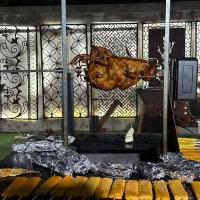 China Outdoor Corten Steel BBQ Grill With Wood Storage And Natural Rusty Surface for sale