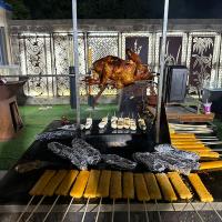 China Rust Resistant Square Steel Natural Oxidized Wood Burning BBQ Grill With Slide Out Ash Tray for sale