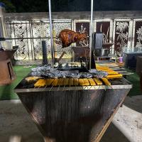 China Rust Resistant Square Steel Natural Oxidized Wood Burning BBQ Grill With Slide Out Ash Tray for sale