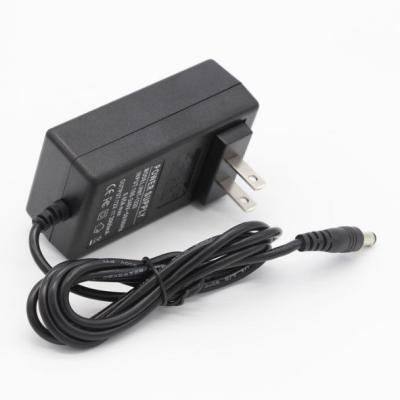China Electric AC DC Output Type 12V 1A 2A Class 2 Power Supply Adapter for Steady Output for sale