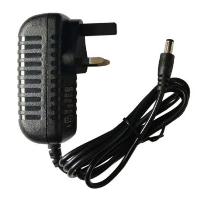 China EU UK AU CN US 100-240V 9V 2A DC Output Power Supply Adapter for Guitar Bass Effect for sale