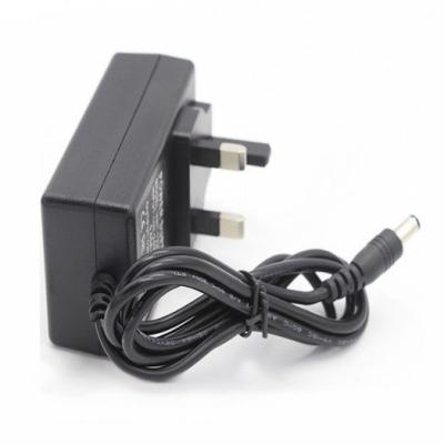 China Black Color UK 12V 1.5A 2A AC Wall Charger Power Cord Adapter for Digital Photo Frame for sale