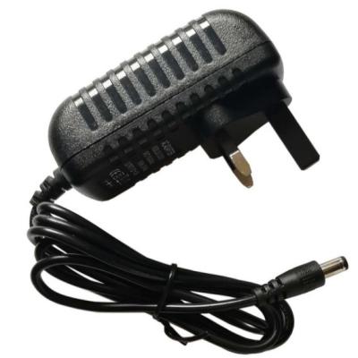 China CE Certified 15V 2A 30W AC DC Power Adapter for Black Products in UK Market for sale