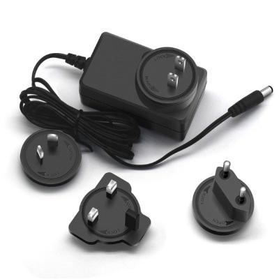 China Efficiency 85% Black C-Power Worldwide Power Adapter with 12V 2A 24W AC100-240V for sale