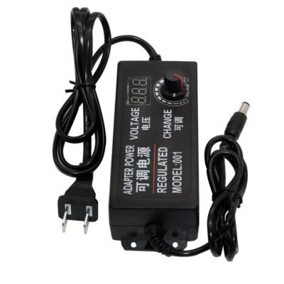 China Adjustable Adapter with Output Power of 60W C-Power's 24W AC100-240V DC 3V-12V Option for sale
