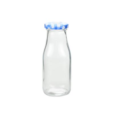 China 11oz BPA Free Glass Milk Bottles Reusable With Metal Twist Lids for sale