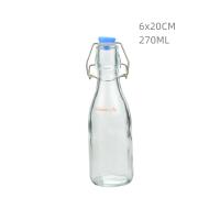 China Clear Glass Milk Bottles 270ML Glass Kombucha Bottles With Stoppers for sale