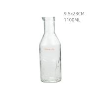 China 1 Liter Milk Glass Bottles Carafe Embossed Designed With Spout for sale