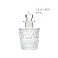 China OEM Reed Diffuser Glass Bottles Embossed Clear Glass perfume Bottles for sale