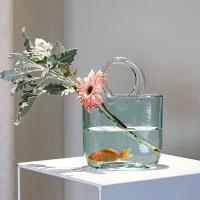 China Wedding Home Decor Modern Glass Handbag Vase Perfect for Fresh Flowers Goldfish for sale