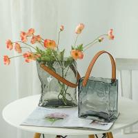 China Modern Unique Clear Handbag Vase Purse Glass Vase Decor for Home Office for sale