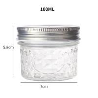 China 100ml Transparent Glass Jars with Custom Logo Designs and Easy Screw On Lid for Various Packaging Needs for sale