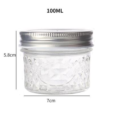 China 100ml Transparent Glass Jars with Custom Logo Designs and Easy Screw On Lid for Various Packaging Needs for sale