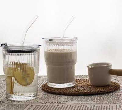 China 410ml Ribbed Clear Glass Drinking Cups With Lids And Straw Ideal For Daily Use for sale