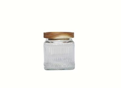 China 500ml Transparent Ribbed Glass Jar with Airtight Lid for Kitchen Storage Free Design for sale