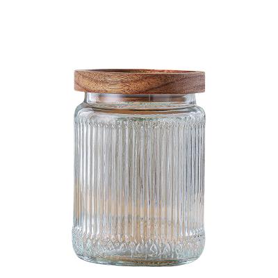 China 700ml Customizable Ribbed Glass Jars Transparent Silk Screen Logo Perfect for Gifts for sale