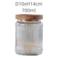 China 700ml Customizable Ribbed Glass Jars Transparent Silk Screen Logo Perfect for Gifts for sale