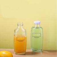 China 350ml Eco Friendly Clear Glass Milk Bottles Leak Proof Reusable for sale