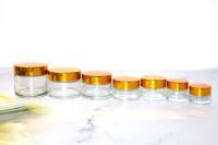China 50ML Clear Glass Cosmetic Containers with Screw Lid Glass Sample Jars for sale