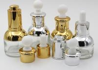 China Transparent Cosmetic Glass Bottles , Cosmetic Spray Bottle Gold Lid for sale