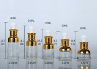 China Transparent Cosmetic Glass Bottles , Cosmetic Spray Bottle Gold Lid for sale