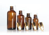 China Fancy Amber Cosmetic Bottles Round Shape Customized Logo Printing for sale