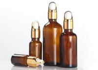 China Fancy Amber Cosmetic Bottles Round Shape Customized Logo Printing for sale