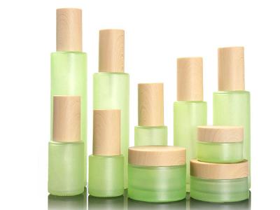 China Frosted Glass Cosmetic Bottles For Essential Oil Lotion Skin Care Cream for sale
