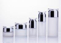 China Round Cosmetic Glass Bottles / Glass Lotion Bottles With Pump for sale
