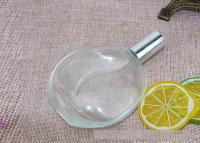 China 100ml Refillable Cosmetic Glass Bottles , Flat Round Empty Perfume Bottles for sale