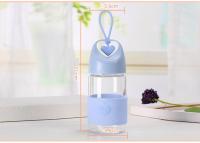 China 300ml Glass Drinking Bottles With Silicone Cover Eco Friendly Feature for sale
