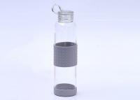 China Round Glass Drinking Bottle With Silicone Sleeve Heat Resistant Feature for sale