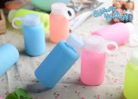 China Blue Glass Water Bottle With Silicone Sleeve Heat Resistant Feature for sale
